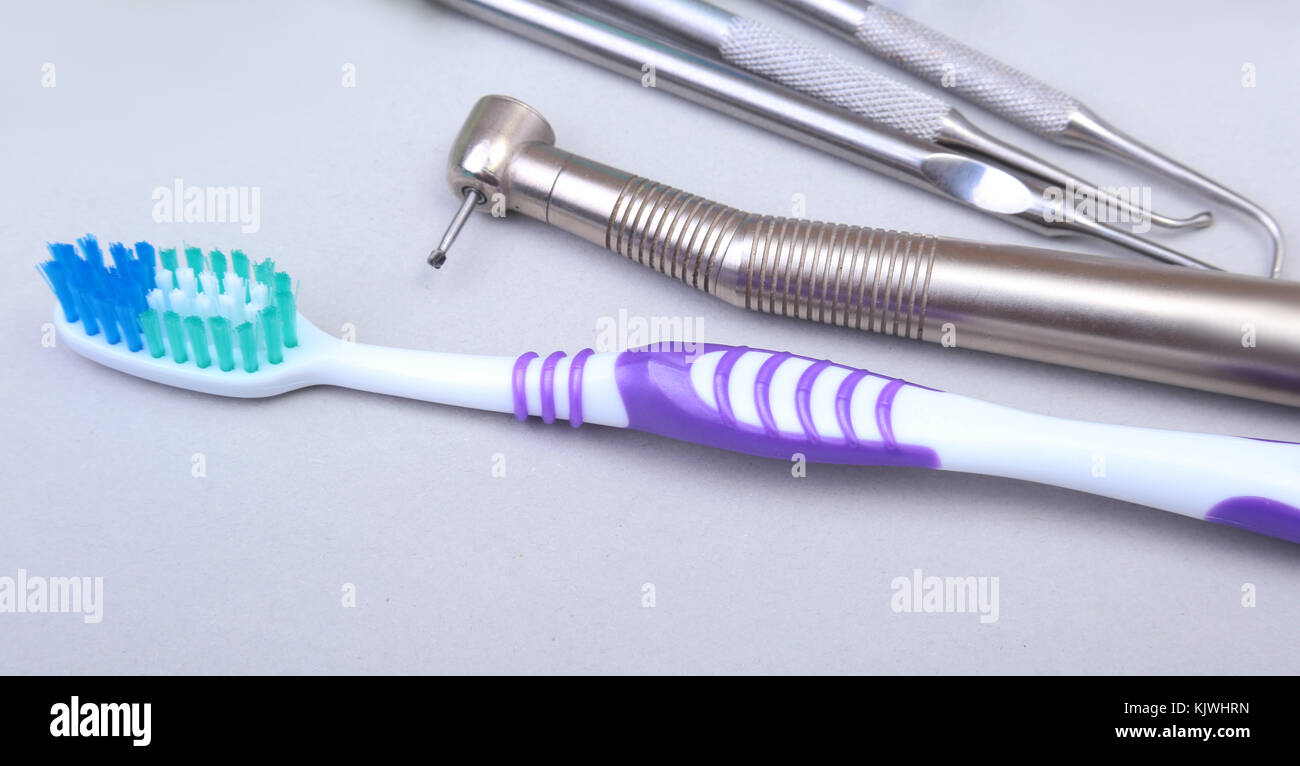 dental care toothbrush with dentist tools isolated on white background ...