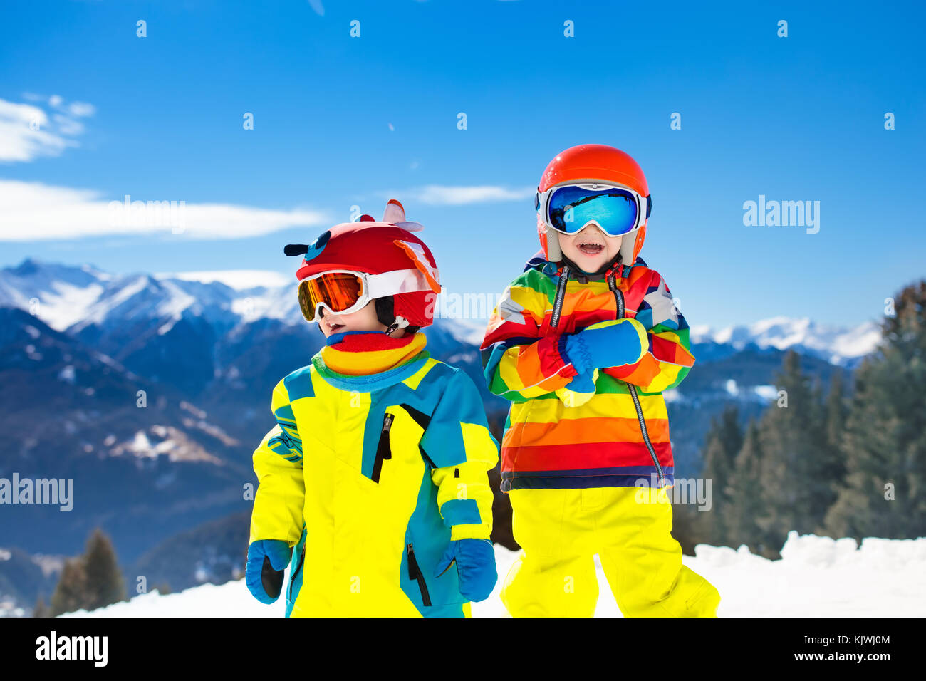 Child skiing in the mountains. Kid in ski school. Winter sport for kids ...