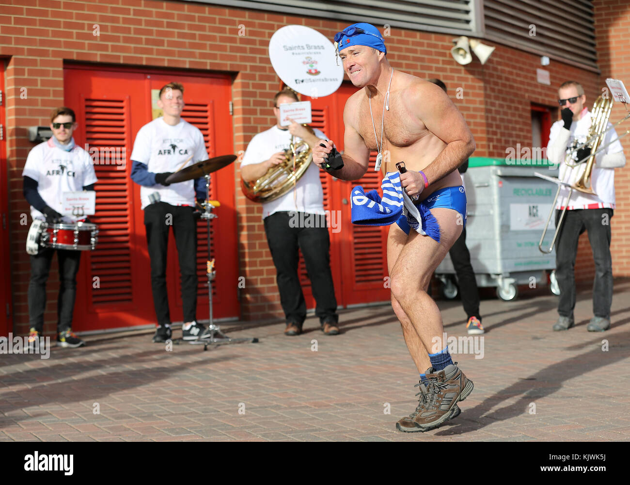 Michael Cullen aka Speedo Mick dances for the Kits For Africa band ...