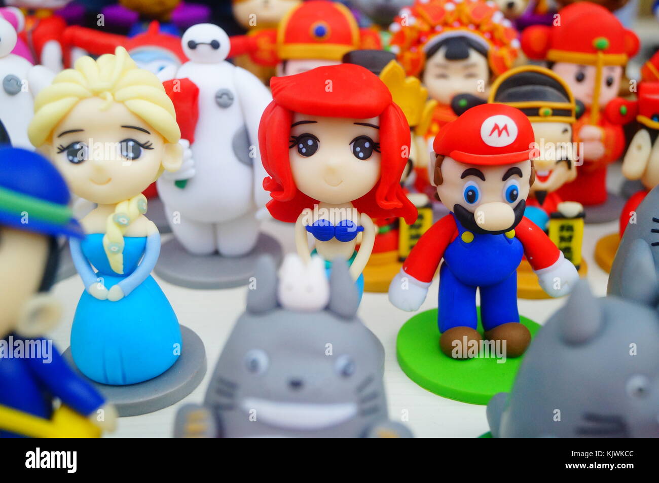 Small doll toys are on display and are very interesting in shape Stock ...