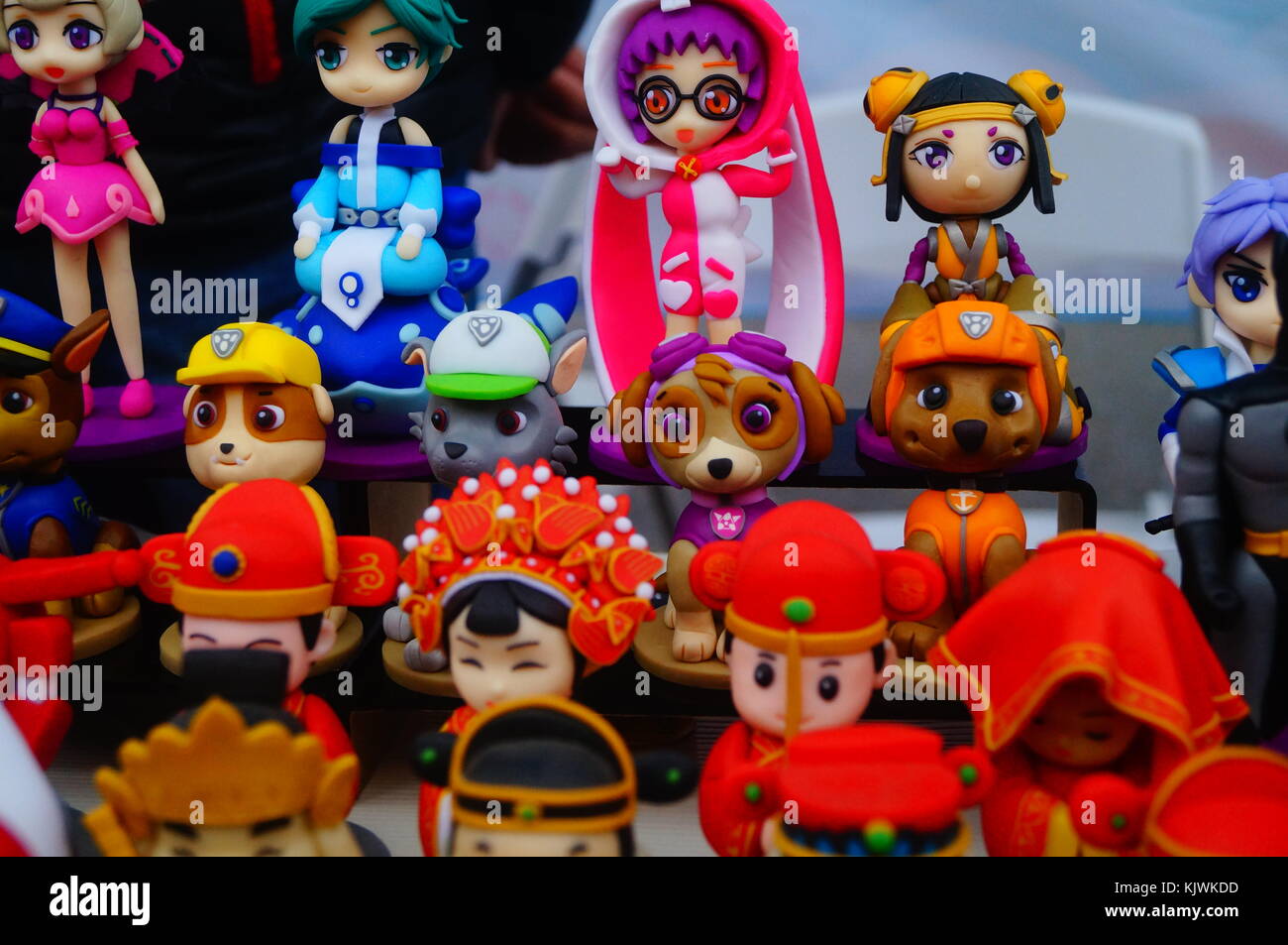 Small doll toys are on display and are very interesting in shape Stock ...