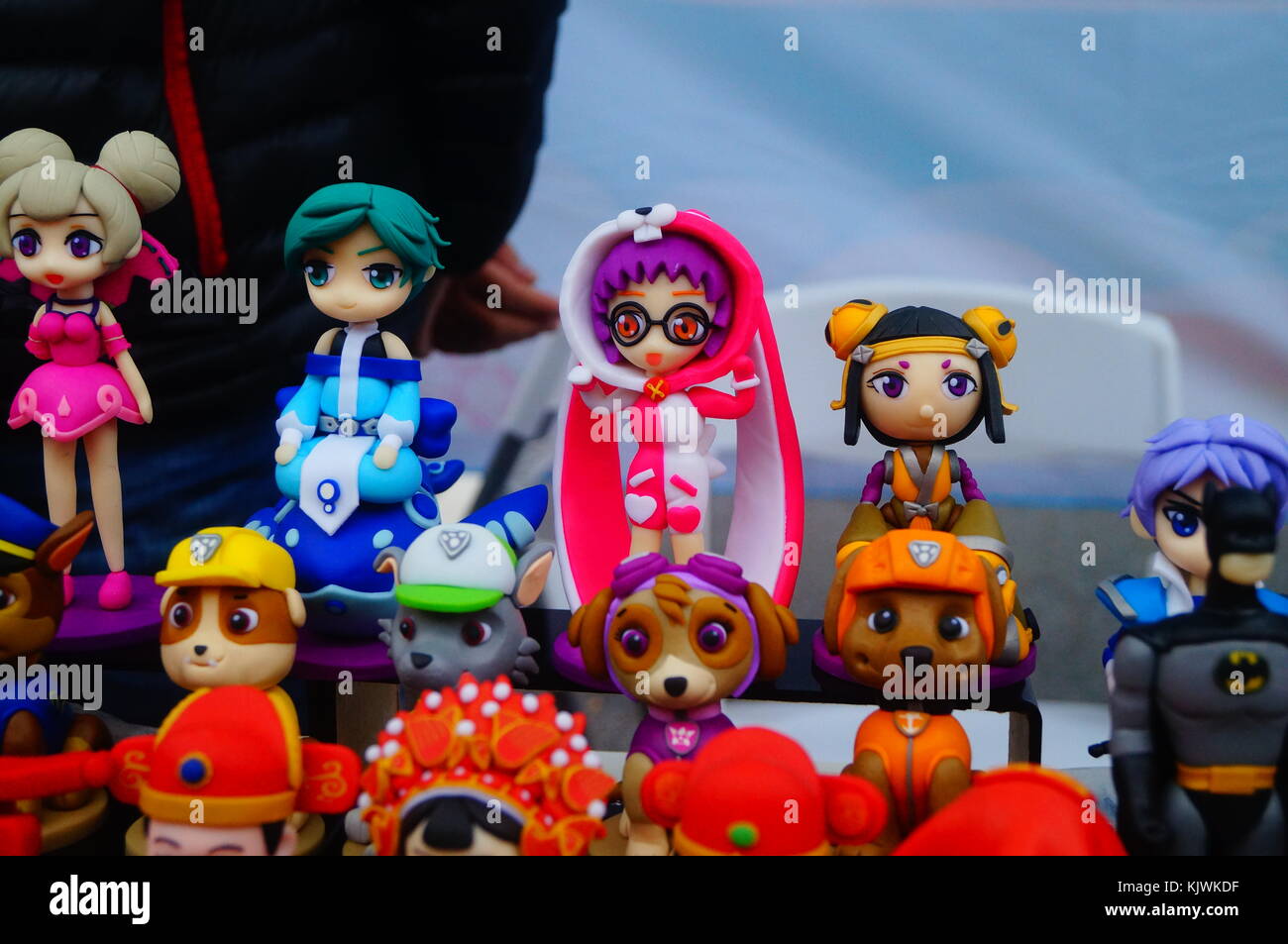 Small doll toys are on display and are very interesting in shape Stock ...