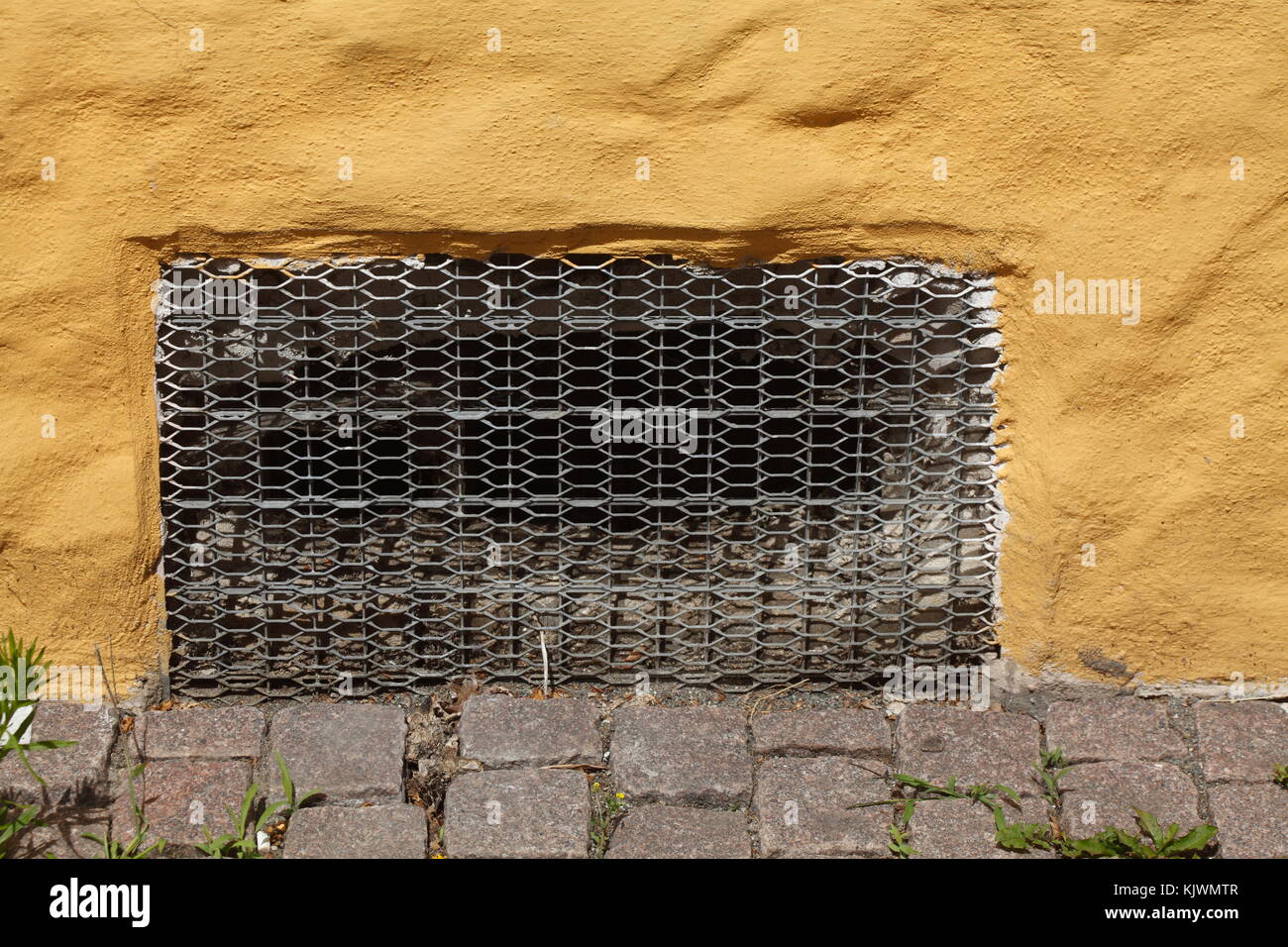 old cellar window with grid Stock Photo - Alamy