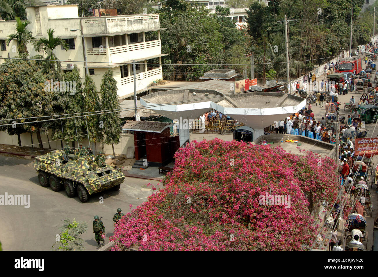 DHAKA, BANGLADESH- FEBRUARY 27, 2009: Army soldiers stand by inside the ...