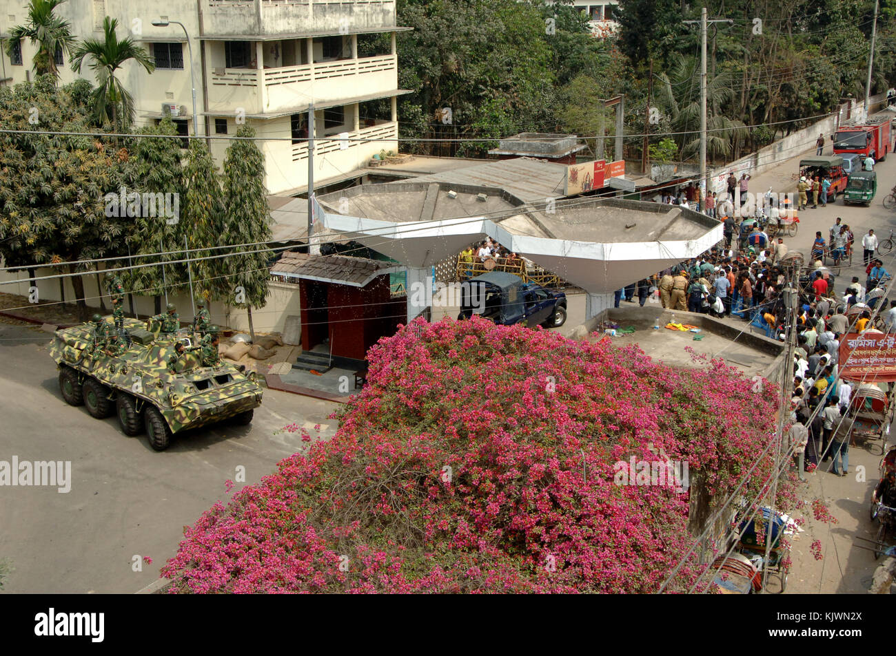 DHAKA, BANGLADESH- FEBRUARY 27, 2009: Army soldiers stand by inside the ...