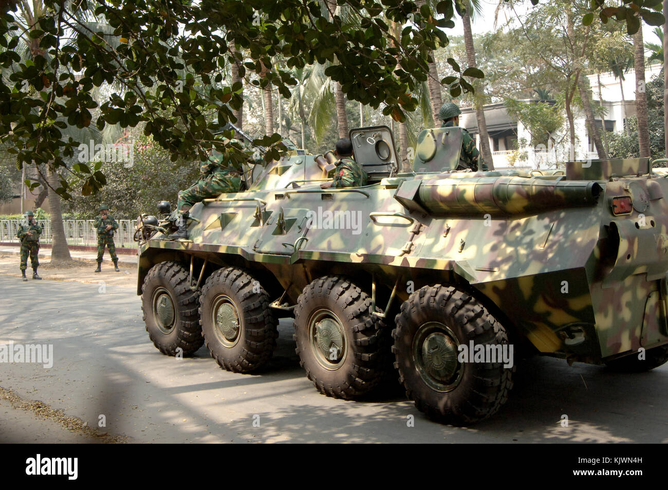 DHAKA, BANGLADESH- FEBRUARY 27, 2009: Army soldiers stand by inside the ...