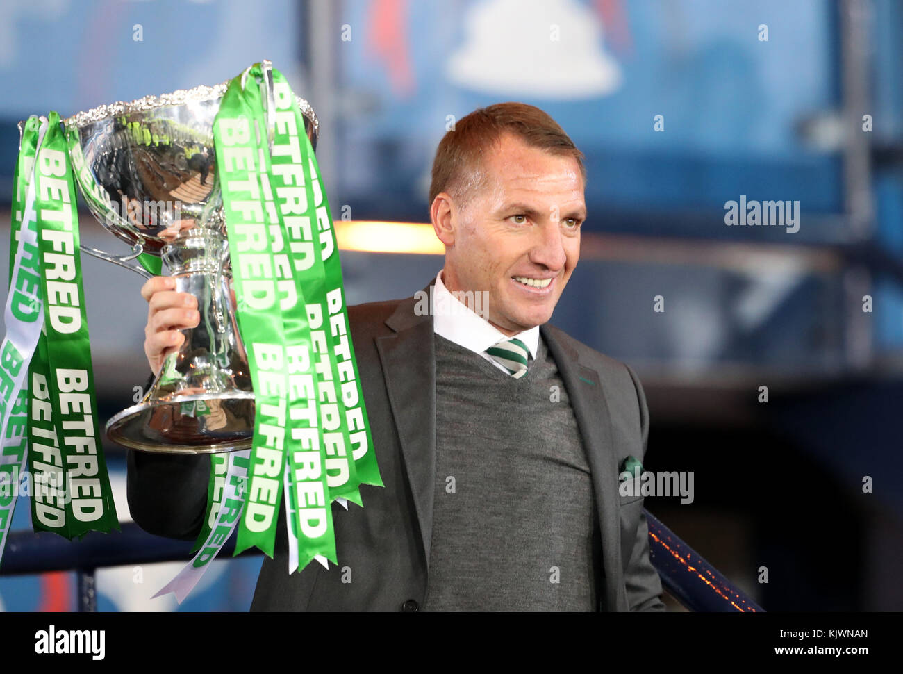 Celtic manager Brendan Rodgers celebrates with the trophy after winning ...