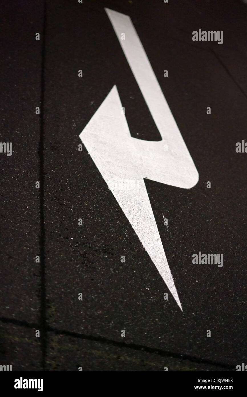 The top view of a directional arrow as a road marking with reflective ...