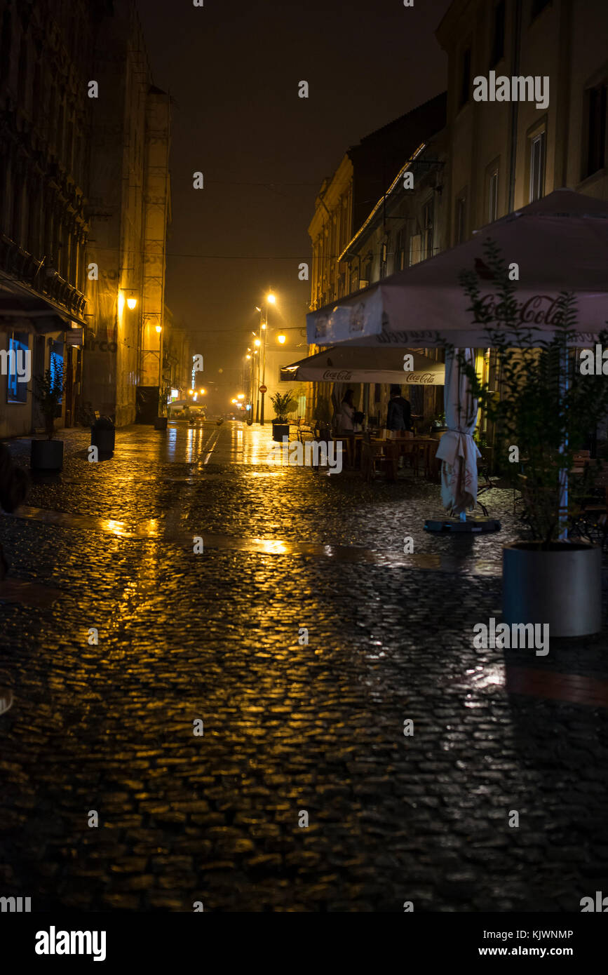 Timisoara streets on a rainy night Stock Photo - Alamy