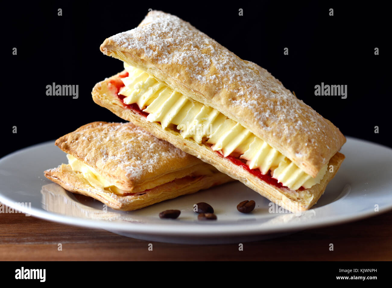 Cake on white plate Stock Photo - Alamy