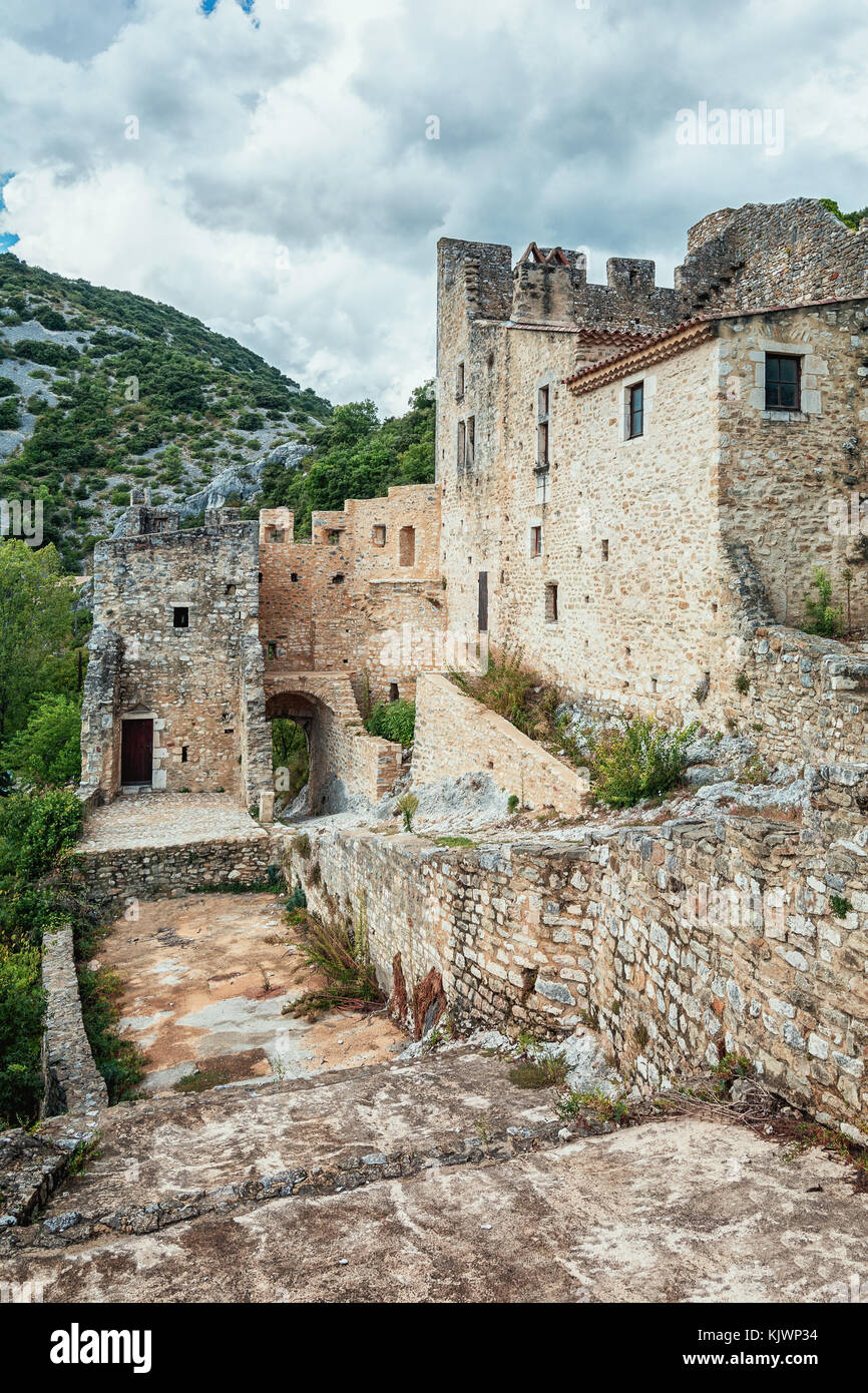 The remains of an old city wall of the village Saint Montan in the ...