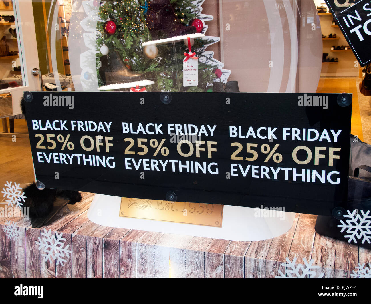 Black Friday signs in high street stores advertising price discounts ...
