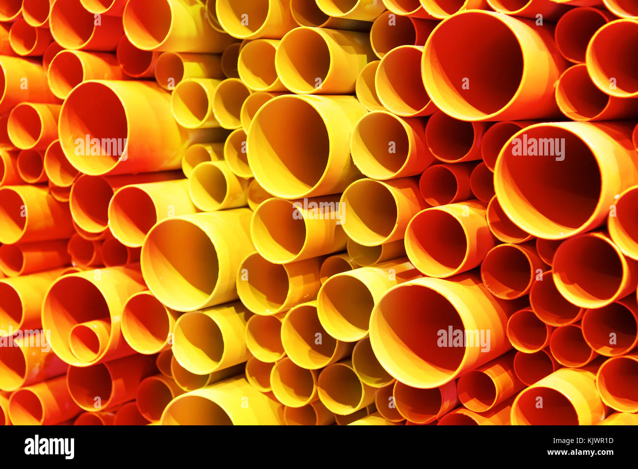 PVC pipes stacked in construction site Stock Photo - Alamy