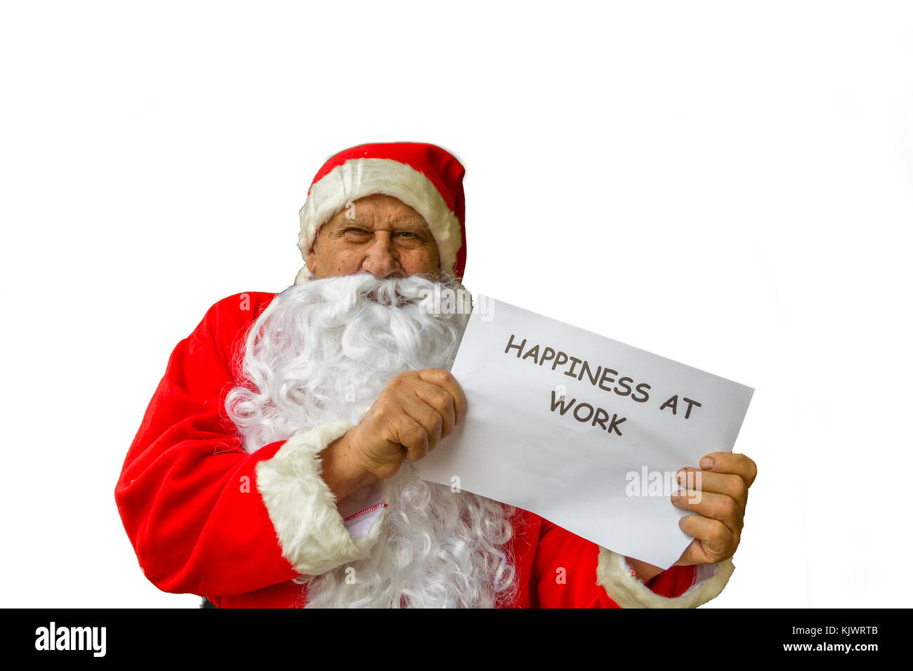 Santa Claus showing signboard with sentence happiness at work isolated ...
