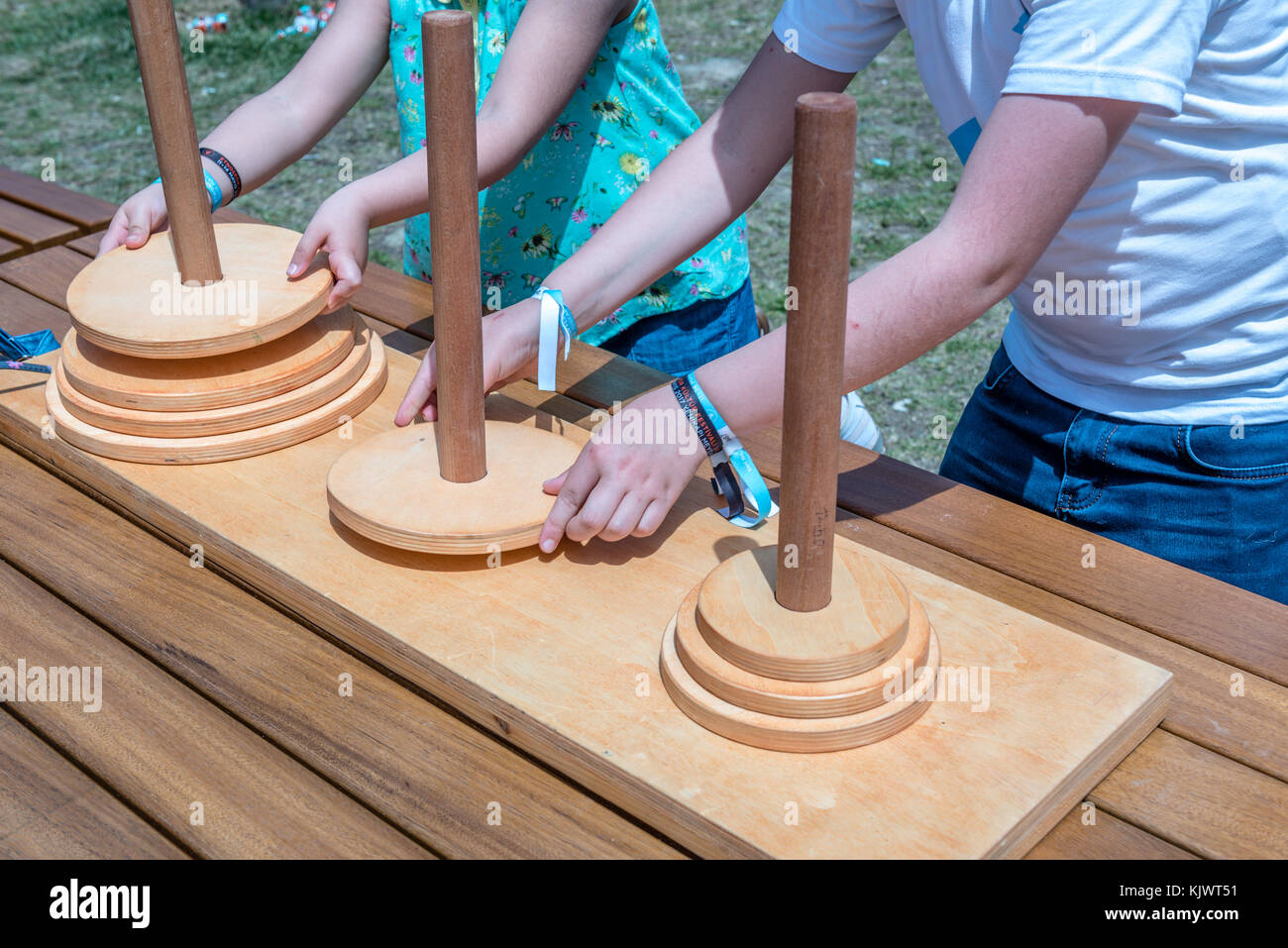 Unidentified children play a traditional Turkish wooden puzzle game ...