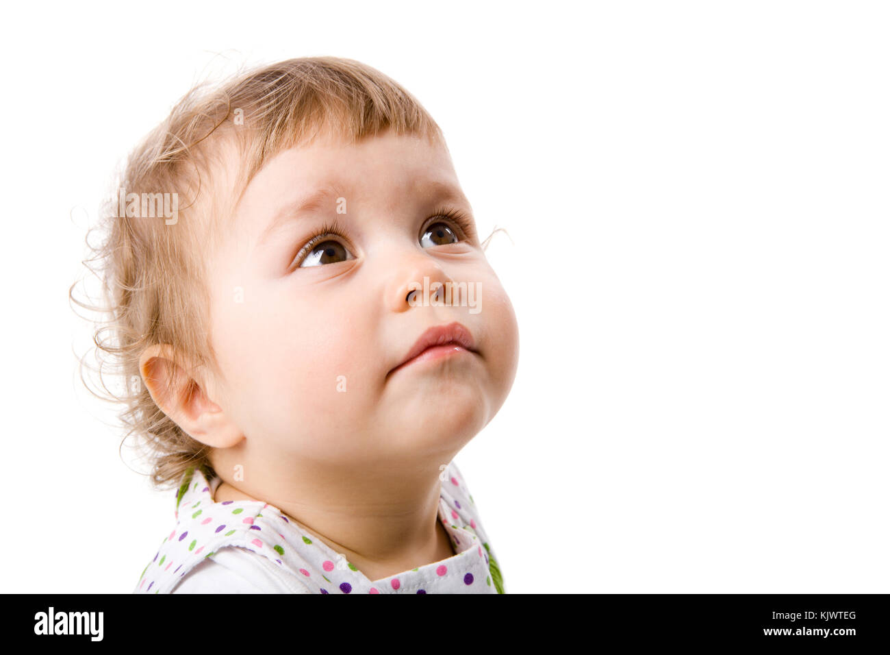 Adorable Baby Girl in one year age looking up isolated on white Stock ...