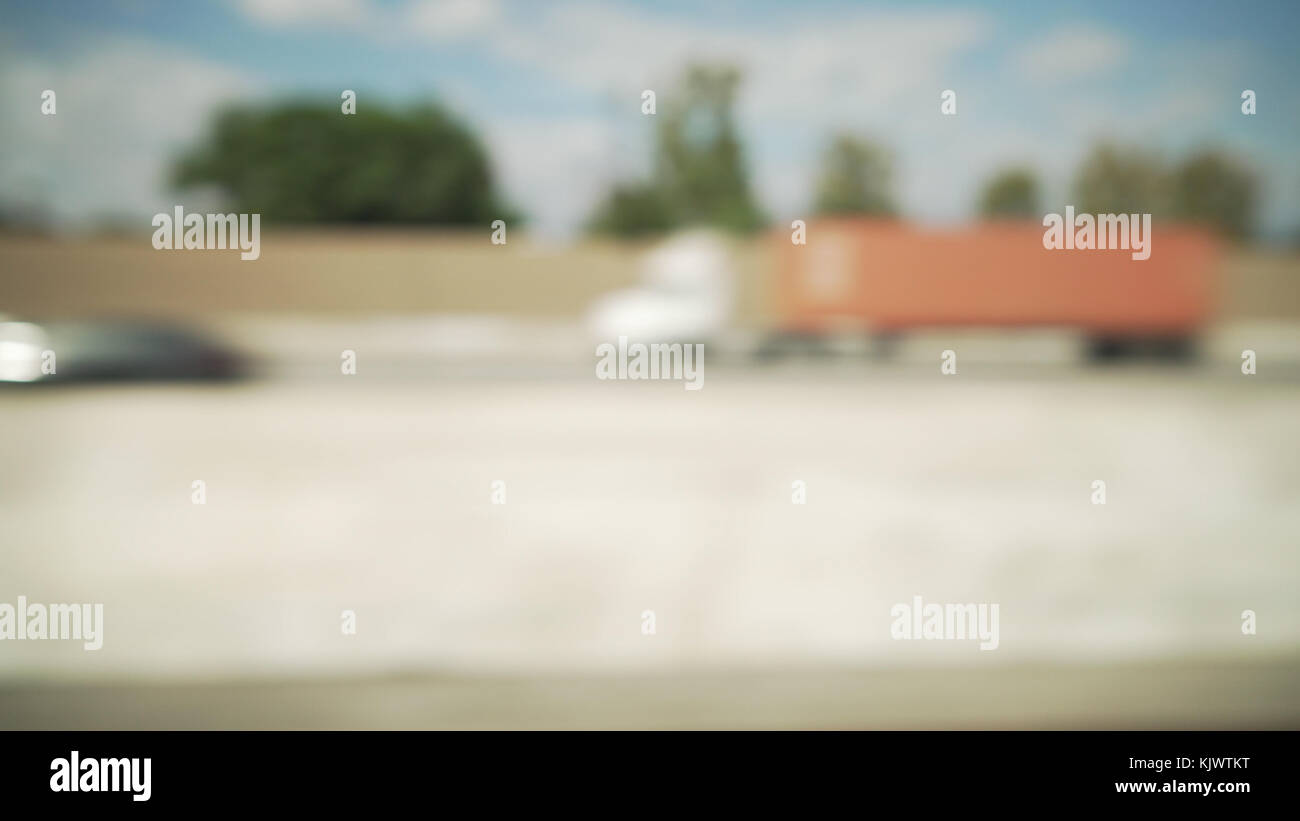 Blurred driving plate los angeles freeway side view Stock Photo - Alamy