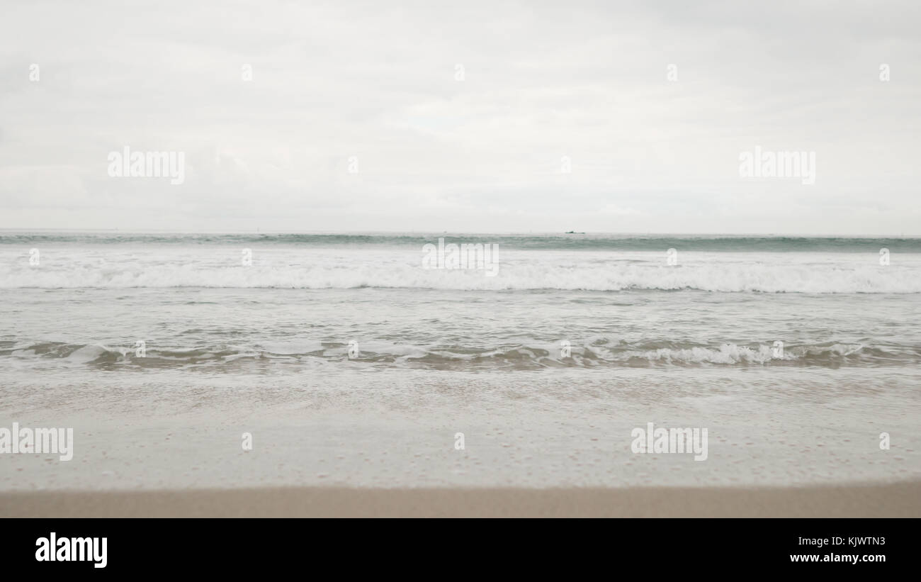 small waves on Santa Monica beach in cloudy november day Stock Photo ...