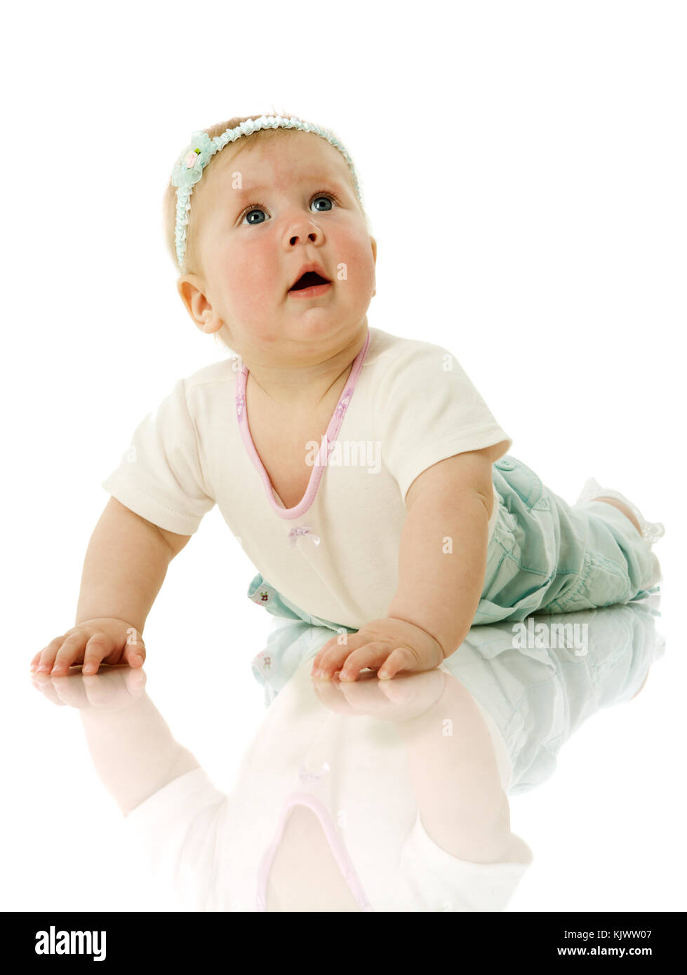 Adorable Baby Girl in half year age isolated on white Stock Photo - Alamy
