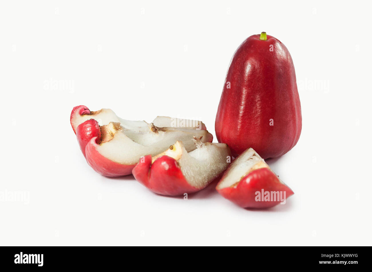 Fresh delicious red rose apples with two pieces cut in haft on isolated ...