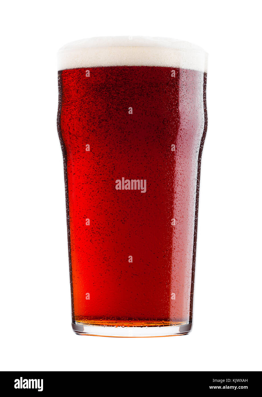 Cold glass of red bitter beer with foam and dew isolated on white ...
