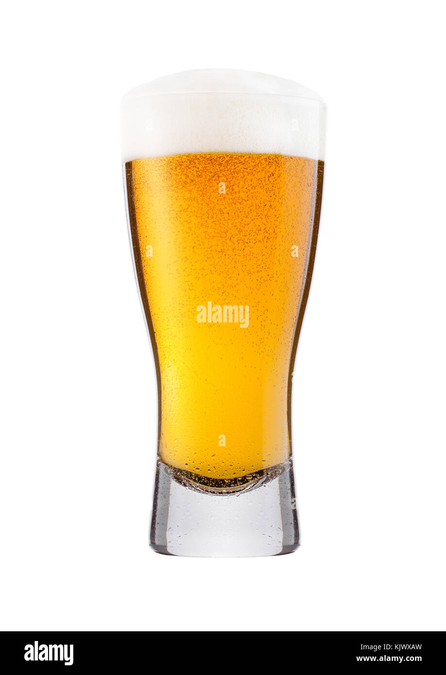 Cold glass of lager beer with foam and dew isolated on white background ...