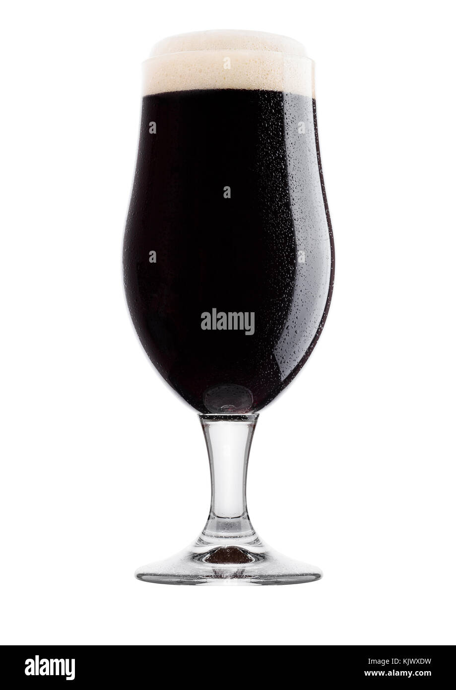 Cold glass of dark beer with foam and dew on white background with ...