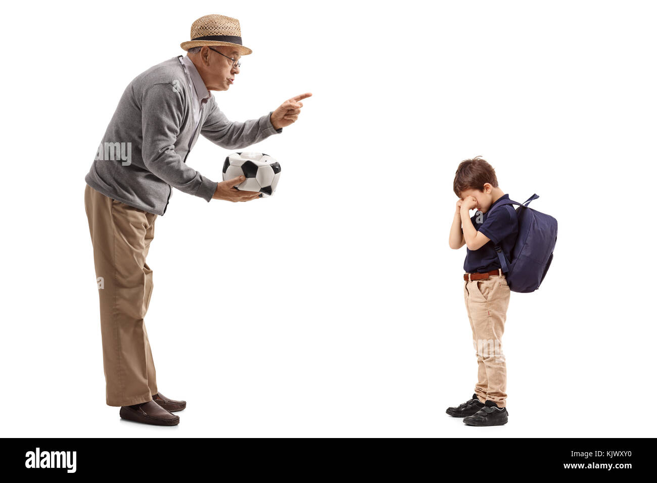 Full length profile shot of a mature man with a deflated football ...