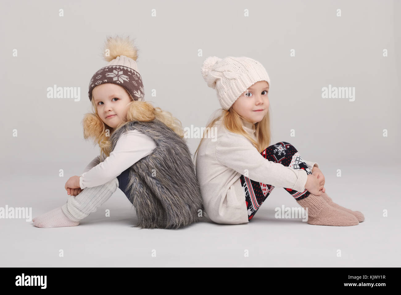 two beautiful girls on white background Stock Photo - Alamy