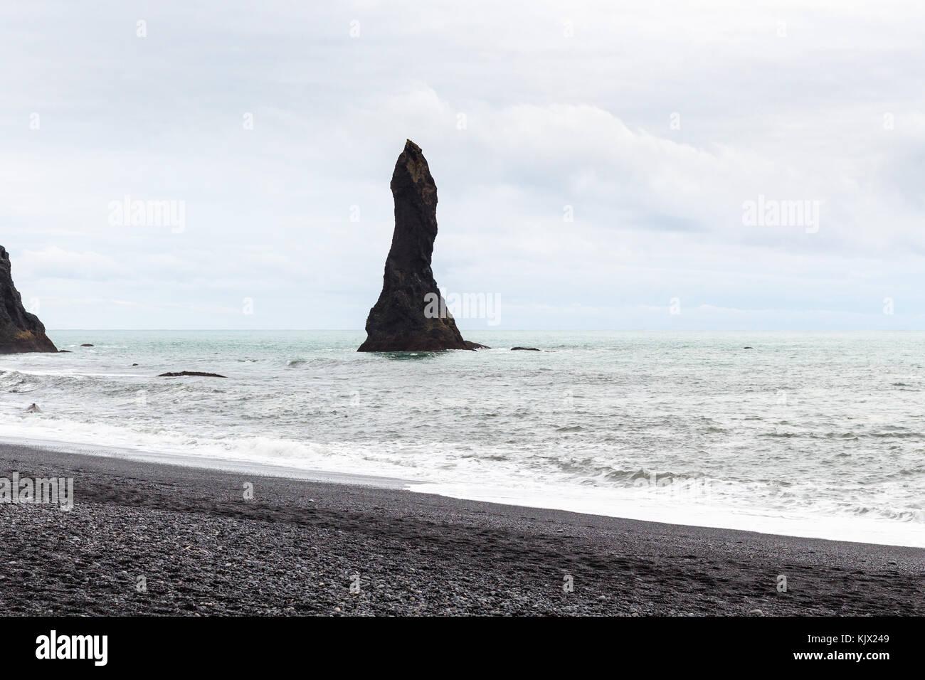 travel to Iceland - Reynisdrangar basalt stack at Reynisfjara black ...