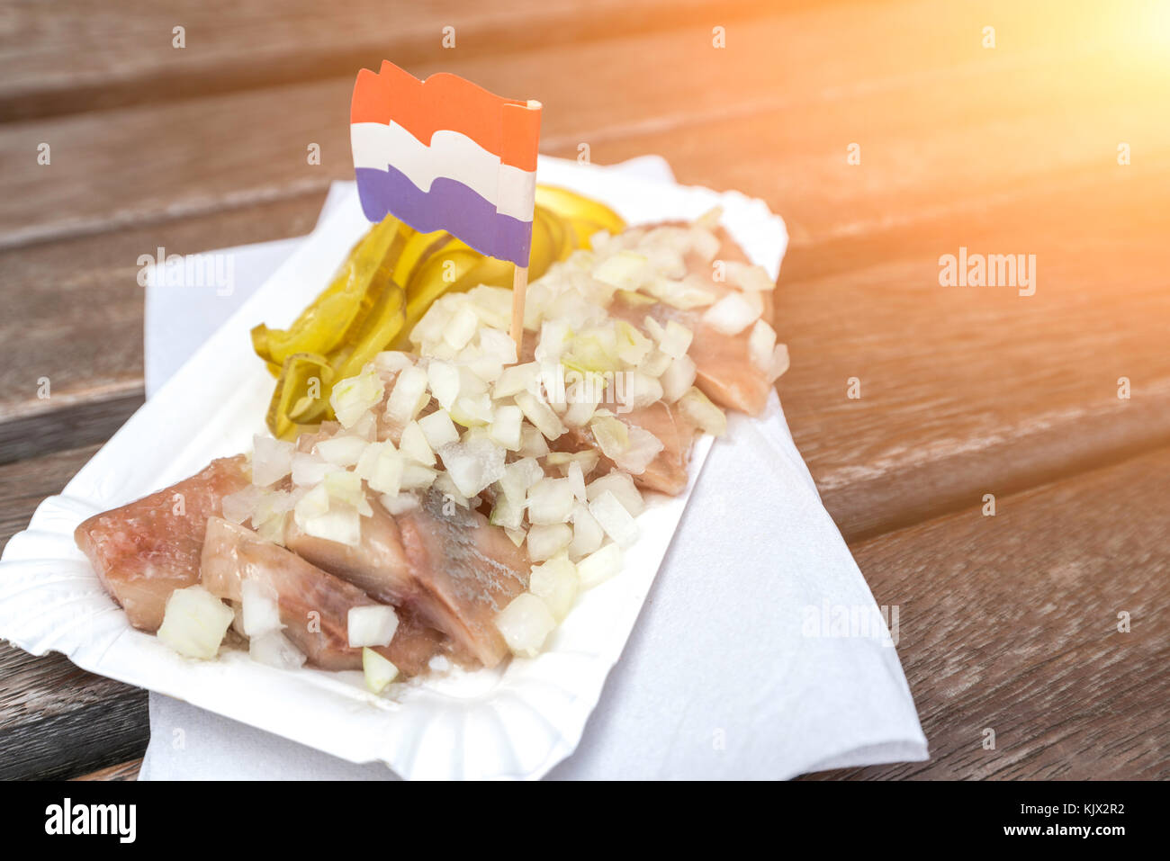 traditional Dutch snack with raw herring with pickles Stock Photo - Alamy