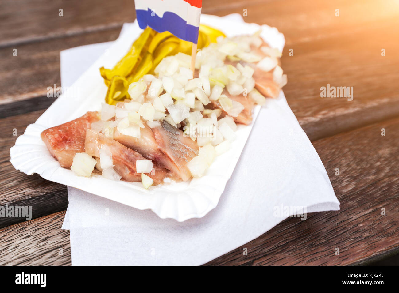 traditional Dutch snack with raw herring with pickles Stock Photo - Alamy