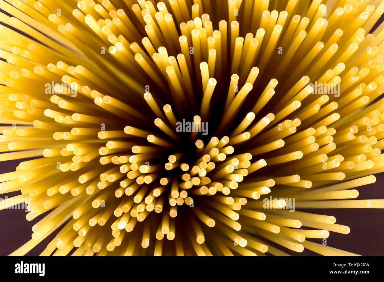 bundle of pasta straws macro photo from the end Stock Photo - Alamy