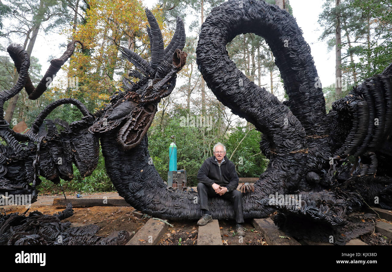 Artist Jim Poolman with a dragon sculpture he has created from more ...