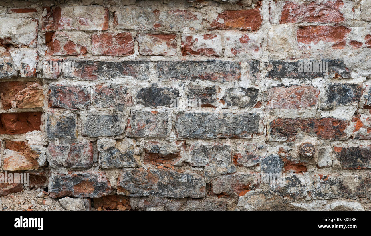 Brick House wall with flaking plaster Stock Photo - Alamy