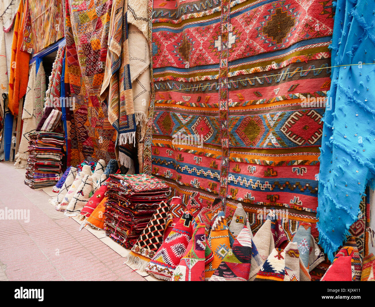 Moroccan carpets for sale in Essaouira Stock Photo - Alamy