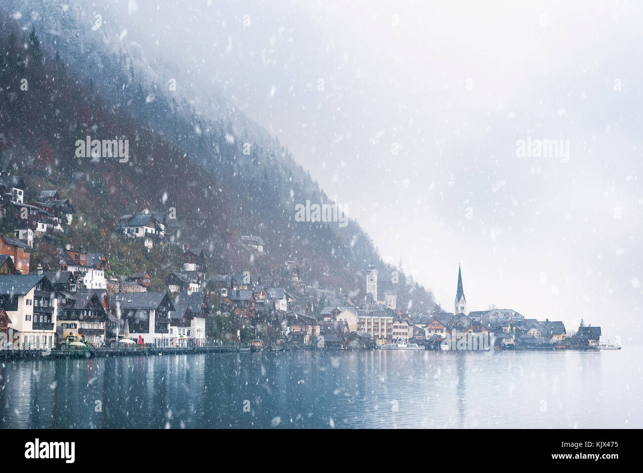 Winter image with the famous Hallstatt market town, surrounded by the ...