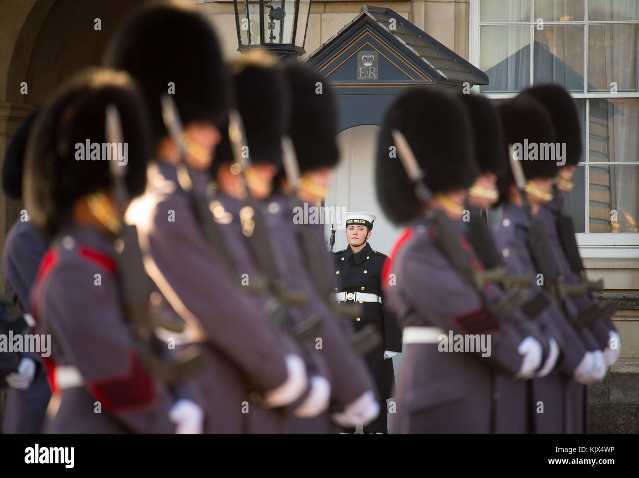 Able seaman Laura Suttle takes her position in a sentry box, as sailors ...