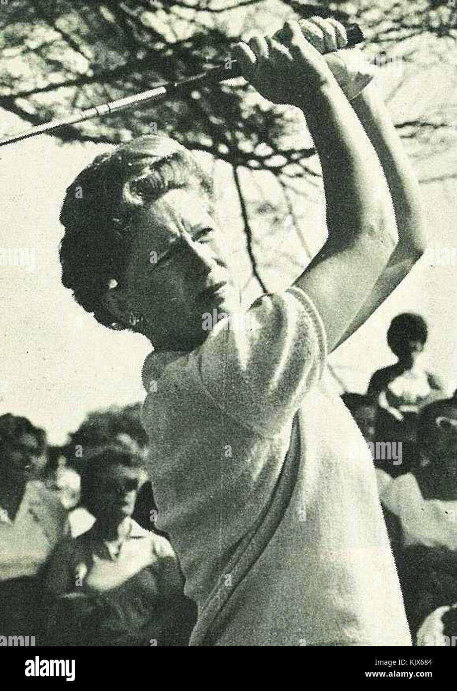 Miss Smith follows the flight of her ball after driving up the fairway ...