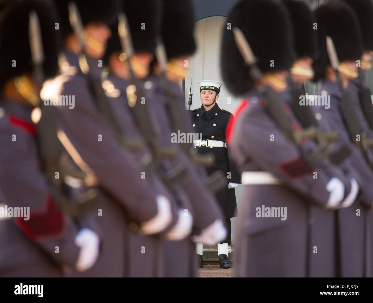 Able seaman Laura Suttle takes her position in a sentry box, as sailors ...