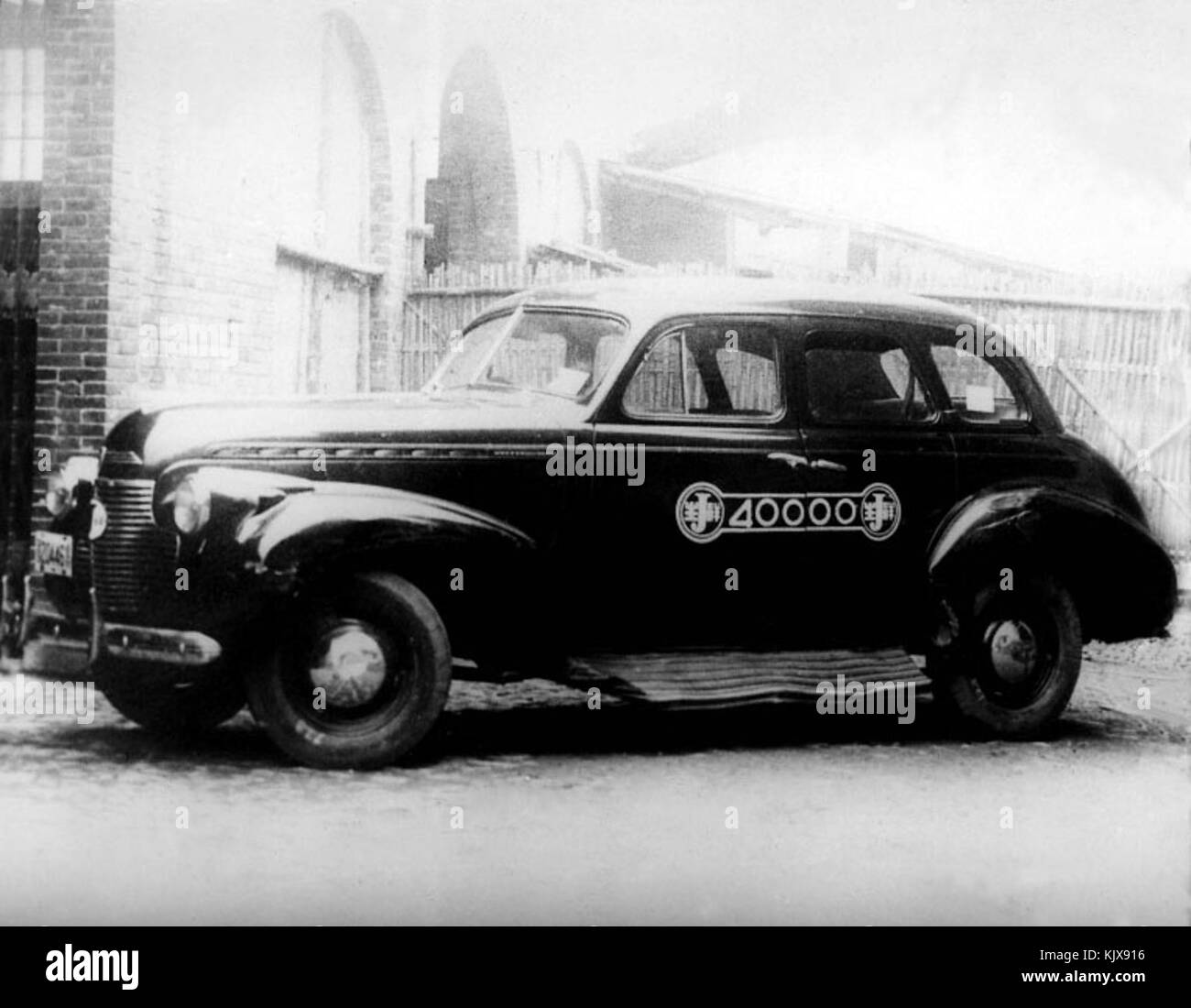 Automobile in garage Black and White Stock Photos & Images - Alamy