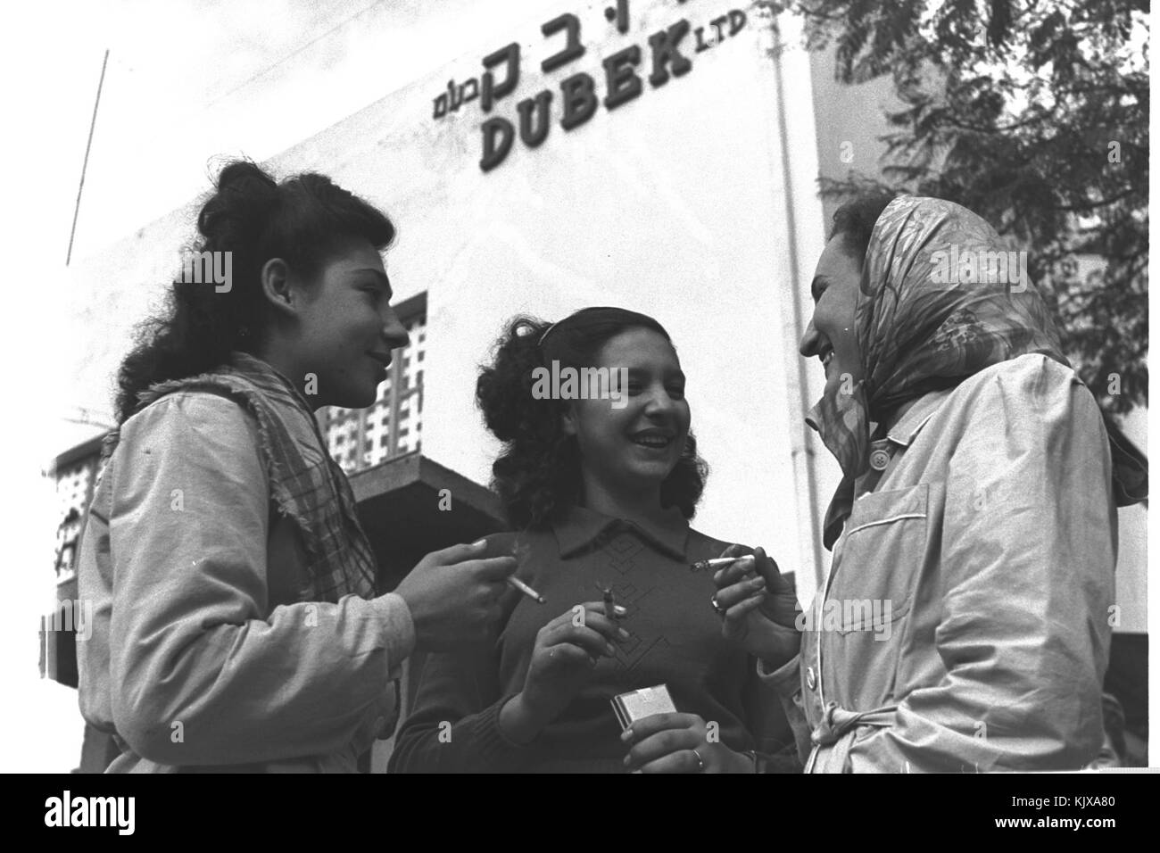 This image features a portrait of Dubek from 1950, a prominent ...