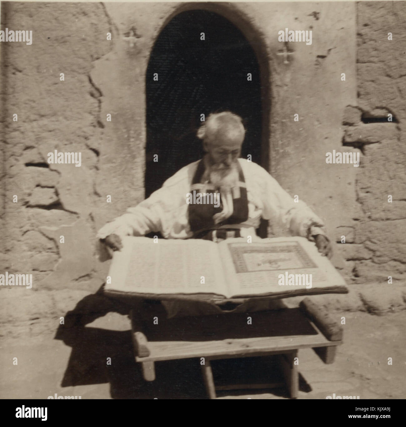 Assyrian priest with manuscript Stock Photo - Alamy