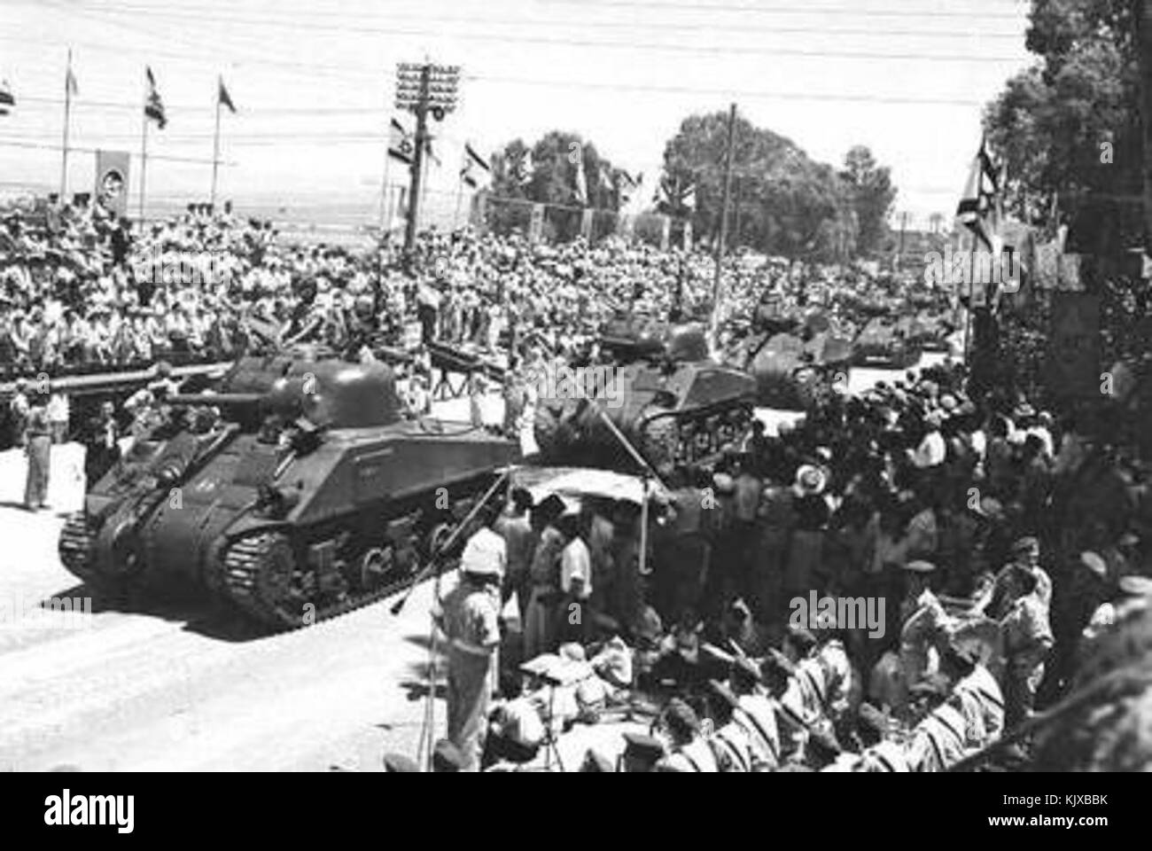 This image depicts a parade held in Ramla, Israel, in 1954 to celebrate ...