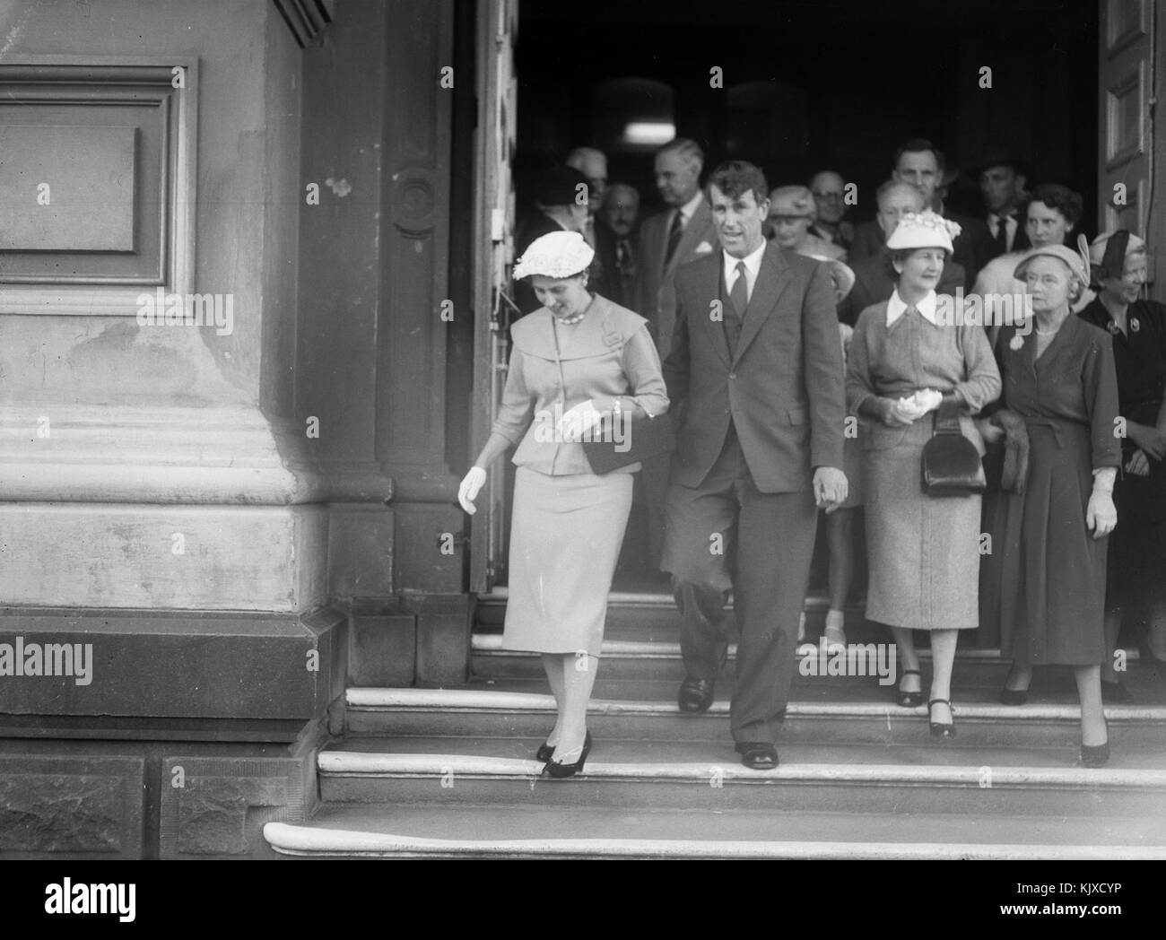 Sir Edmund and Lady Louise Hillary leaving the Wellington Town Hall ...