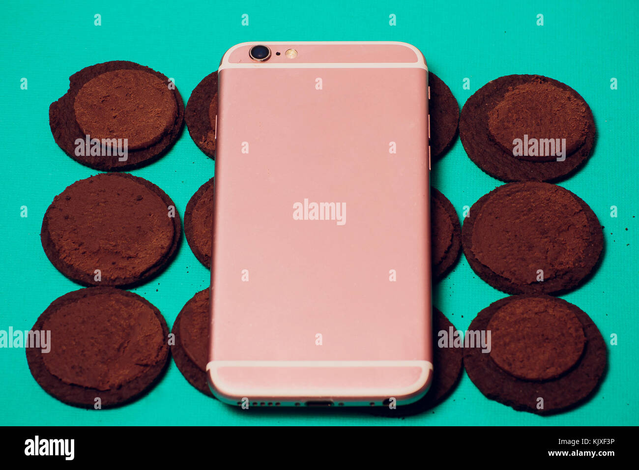 Modern mobile smartphone chocolate cookies stacked served milk the ...
