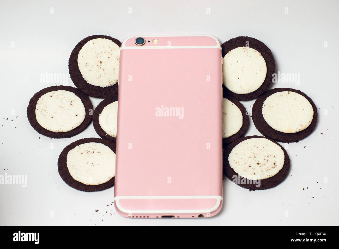 Modern mobile smartphone chocolate cookies stacked served milk the ...