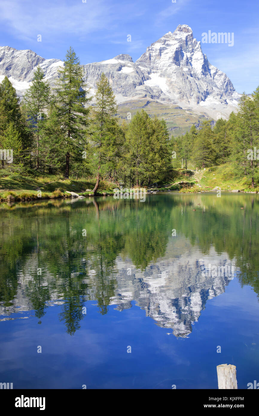 Beautiful view with mountain and blue lake with clear reflection in ...