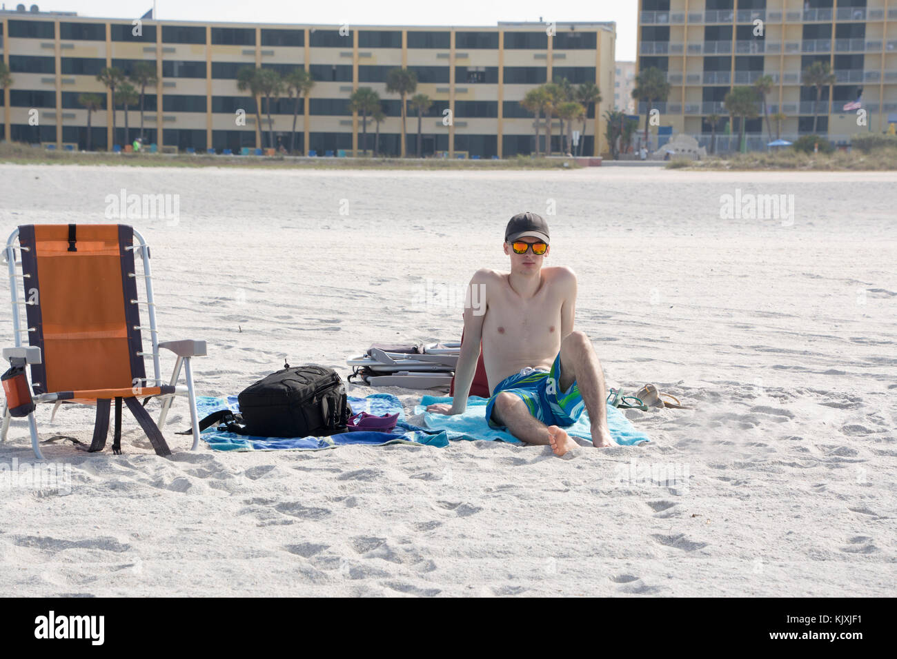 Man on vacation beach chair hi-res stock photography and images - Alamy