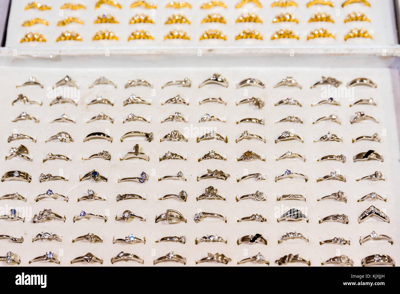 Many Gold and white gold rings for sale on a stall in Grand Bazaar ...